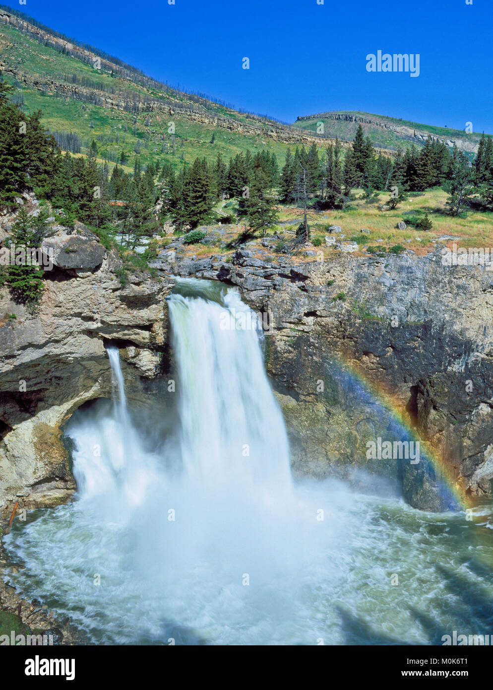 double waterfall at boulder river natural bridge and falls near big ...