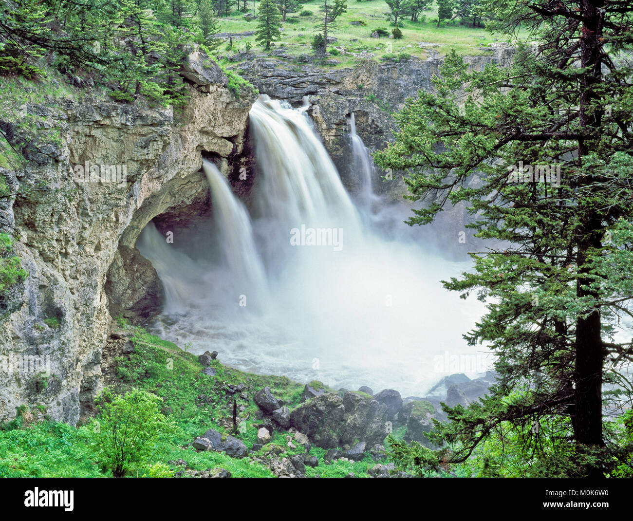 double waterfall at boulder river natural bridge and falls near big ...