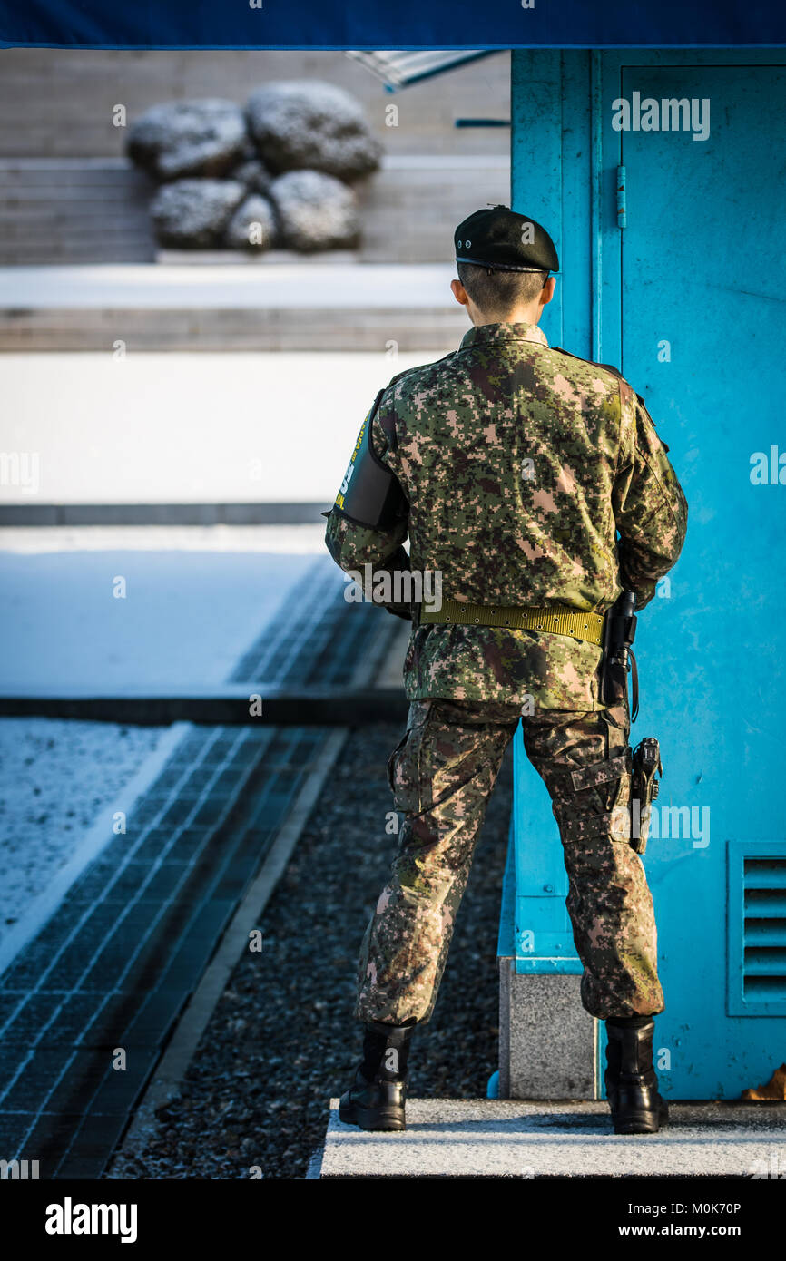 South Korean soldiers standing guard, facing North Korea at the DMZ ...