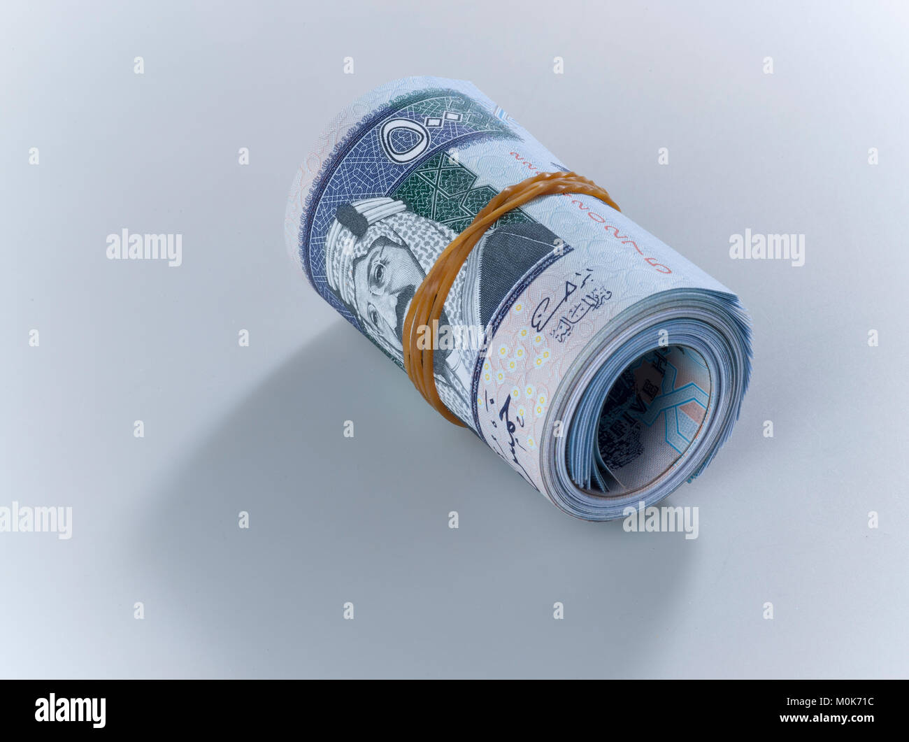 Roll of Saudi Riyal Banknotes of 500 with image of King Abdulaziz close ...
