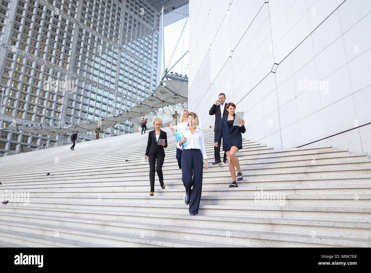 Foreign business colleagues in official journey talking and keep Stock ...