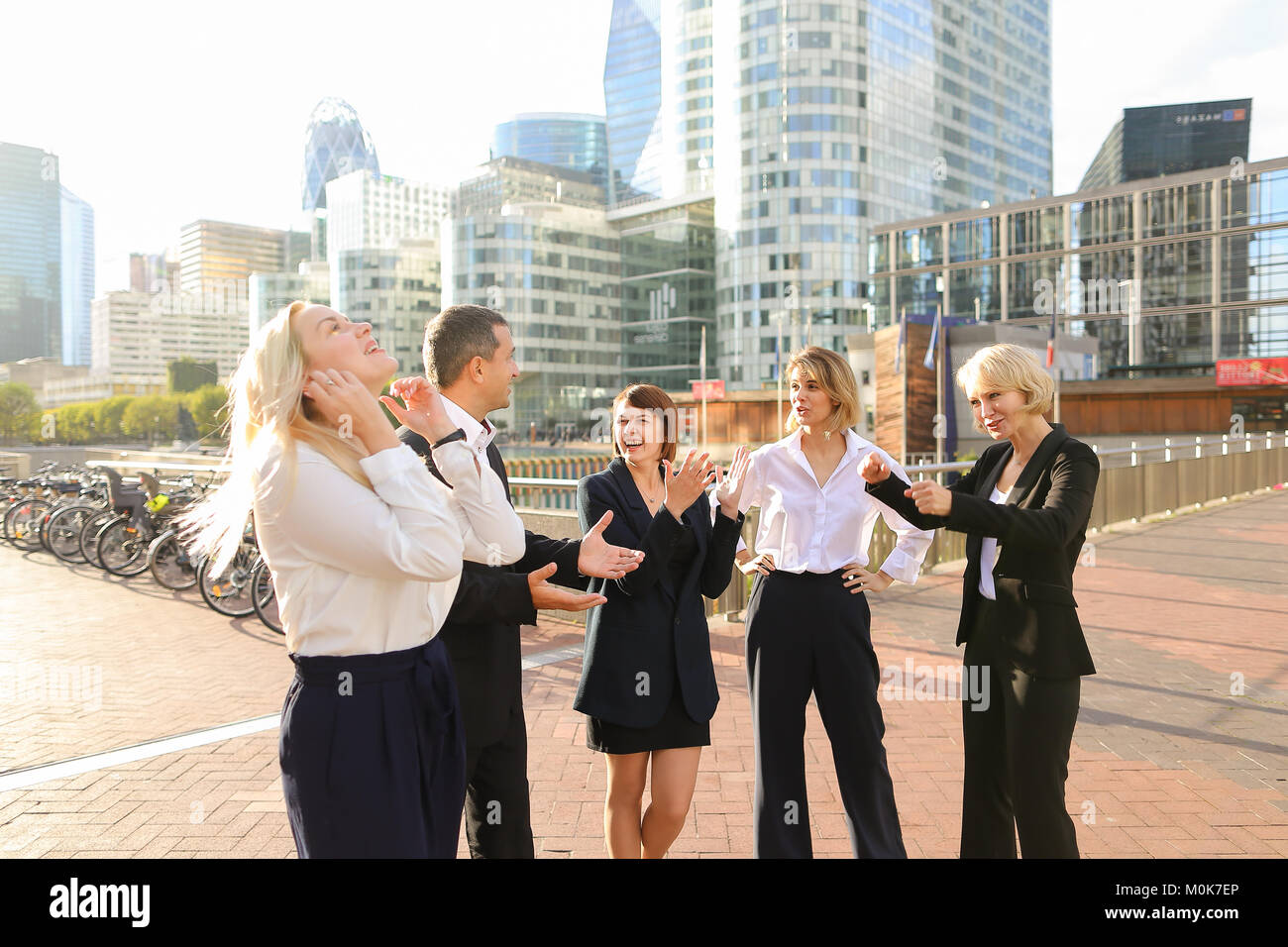 Successful business team greeting each other with good result ou Stock ...