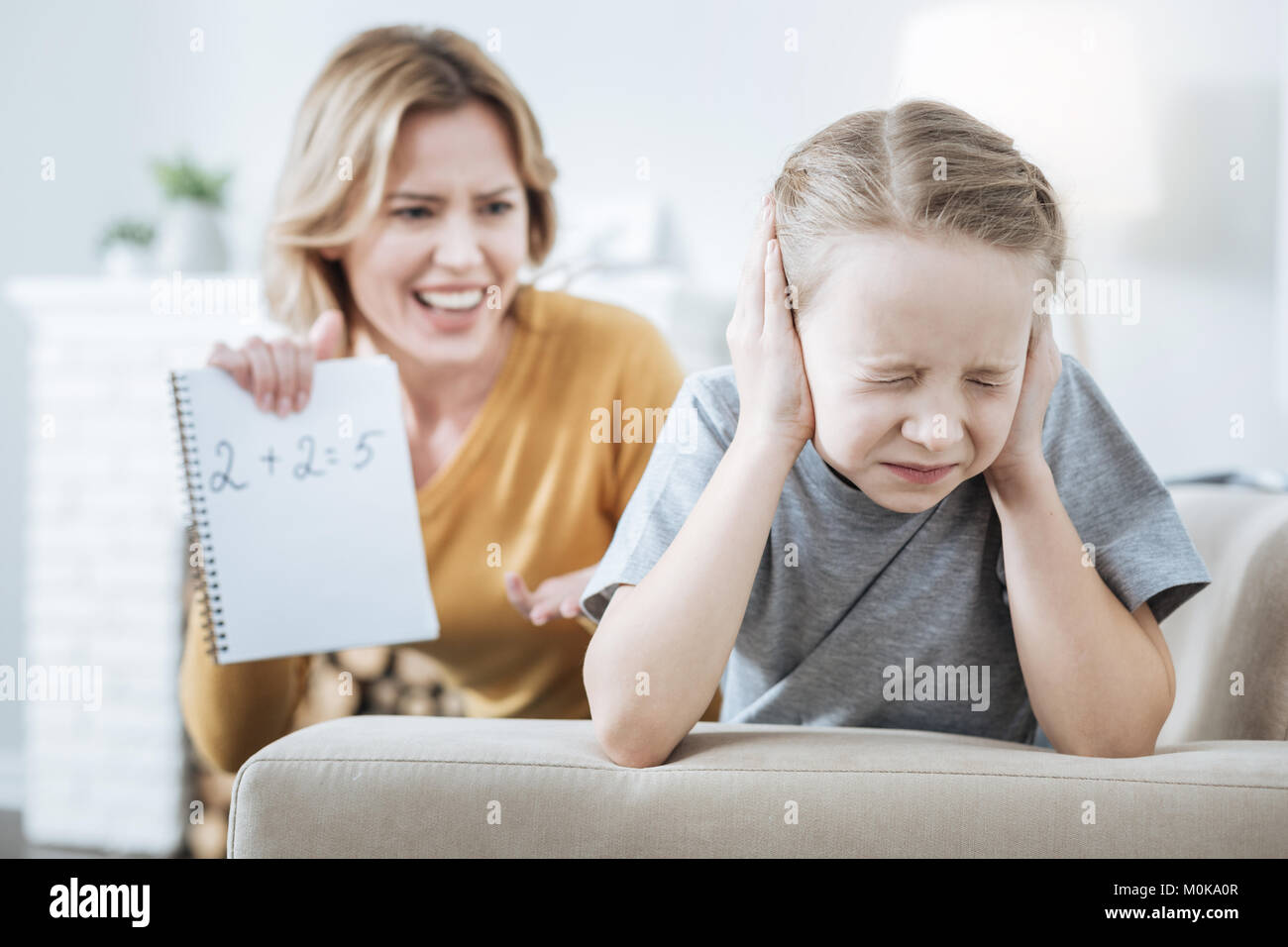 Outraged mother shouting at her child Stock Photo - Alamy