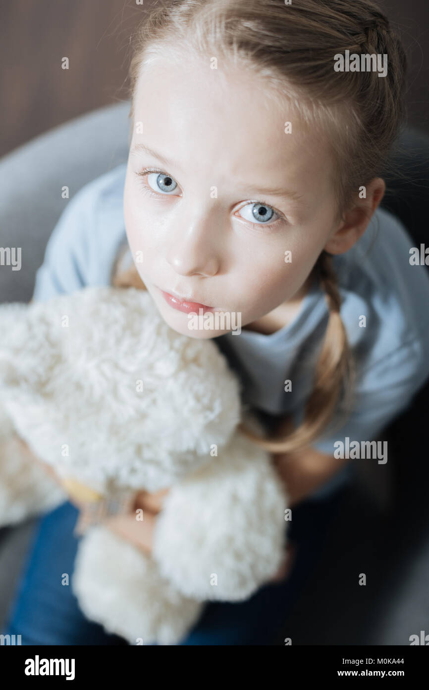 Child unhappy hugging hi-res stock photography and images - Alamy