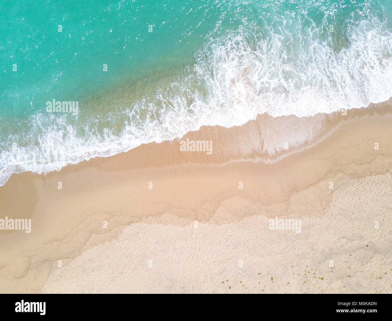 Aerial view of sandy beach and ocean with waves Stock Photo - Alamy