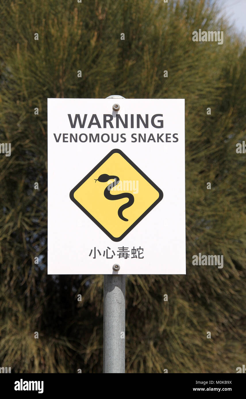 Venomous snake warning sign on an Australian walking trail Stock Photo ...