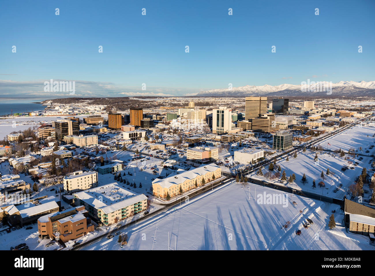 Aerial view of snow covering downtown Anchorage and the Chugach and ...