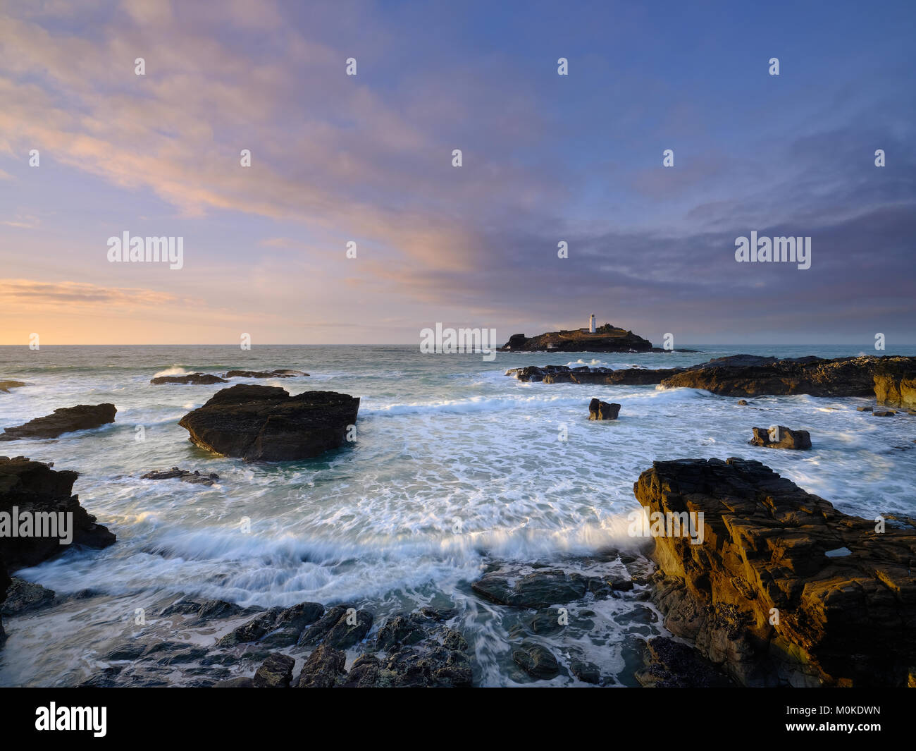 Godrevy Beach and Rocks at sunset dusk Stock Photo - Alamy