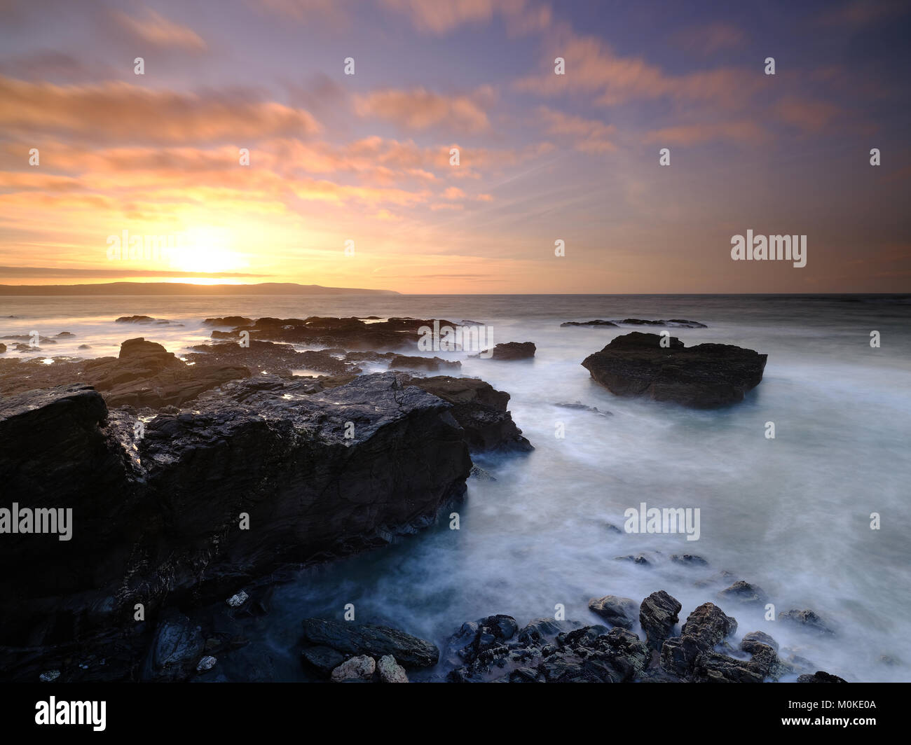 Godrevy Beach and Rocks at sunset dusk Stock Photo - Alamy