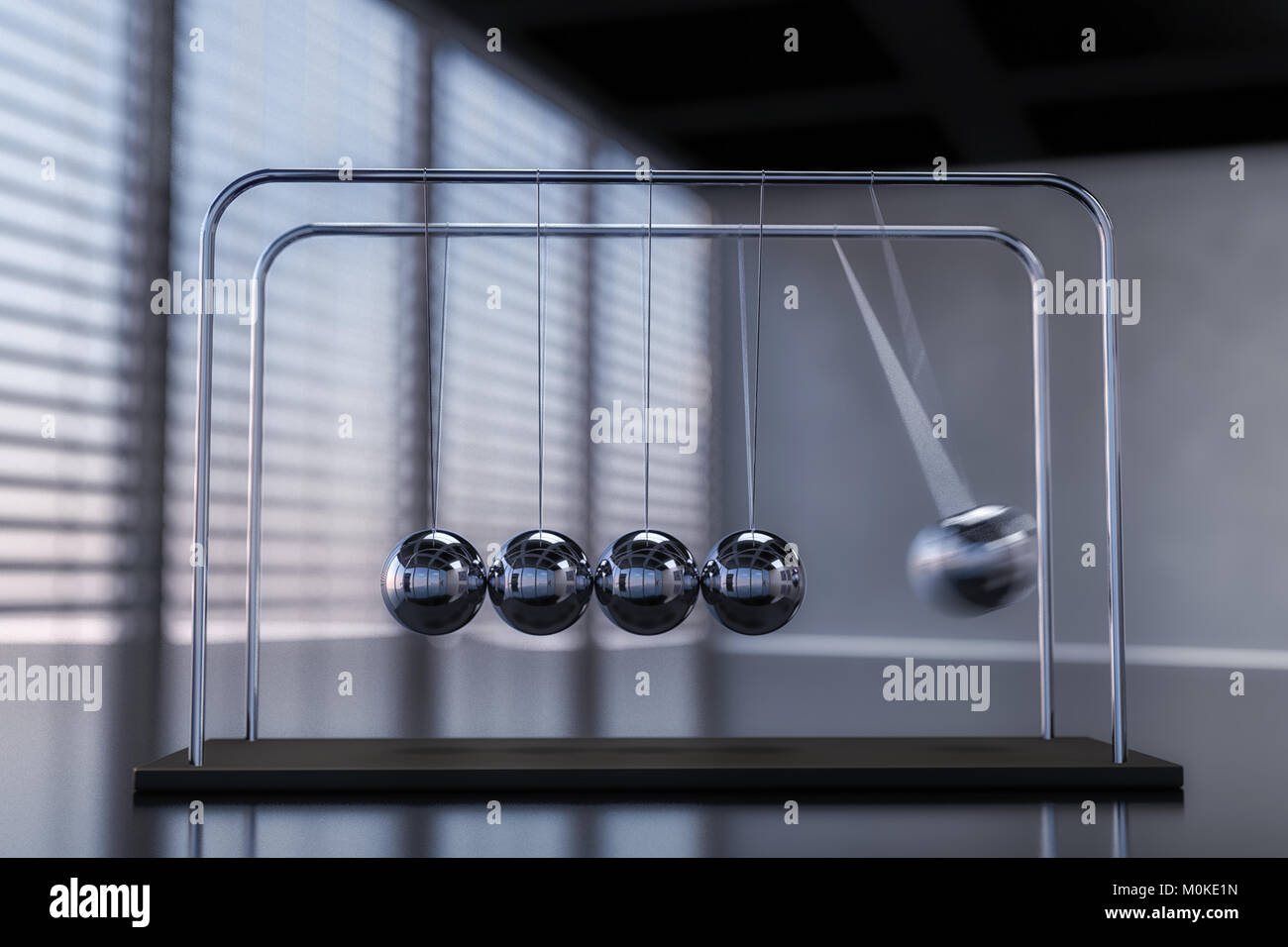 Newton's cradle pendulum Stock Photo - Alamy