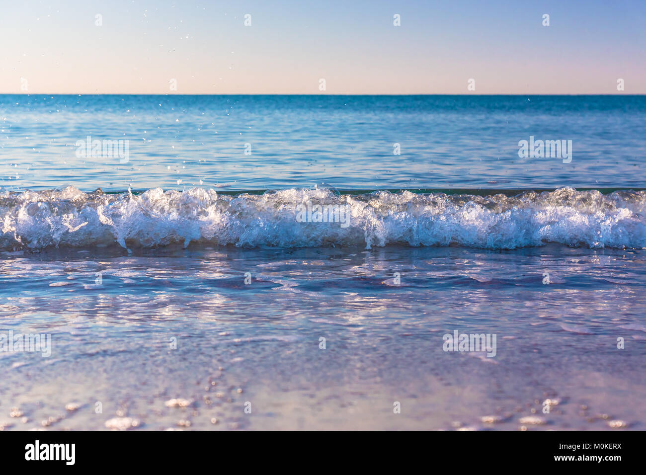 Morning wave at Mediterranean sea coast Stock Photo - Alamy