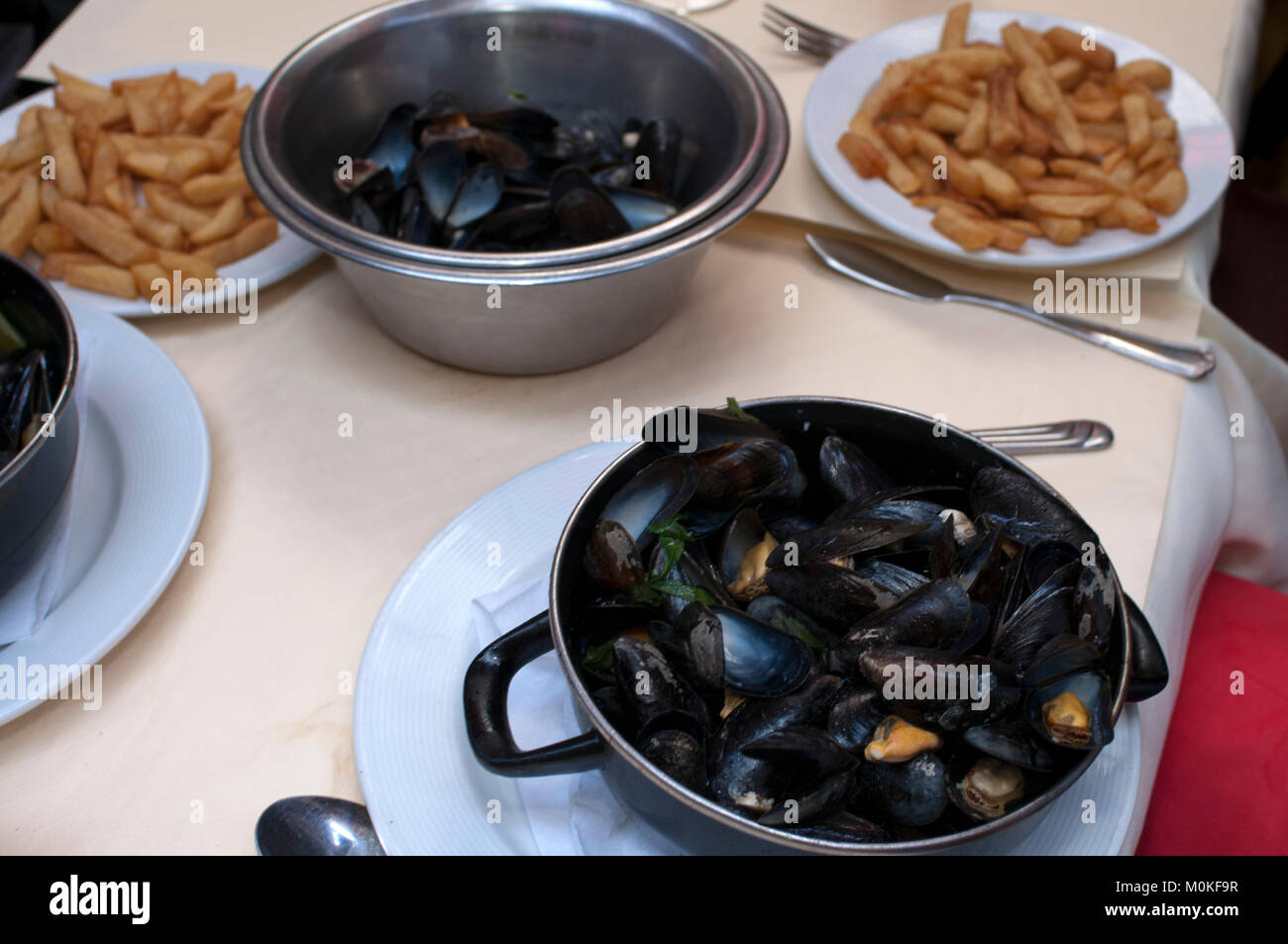 Typical dish of Brussels: baked mussels with white wine with ...