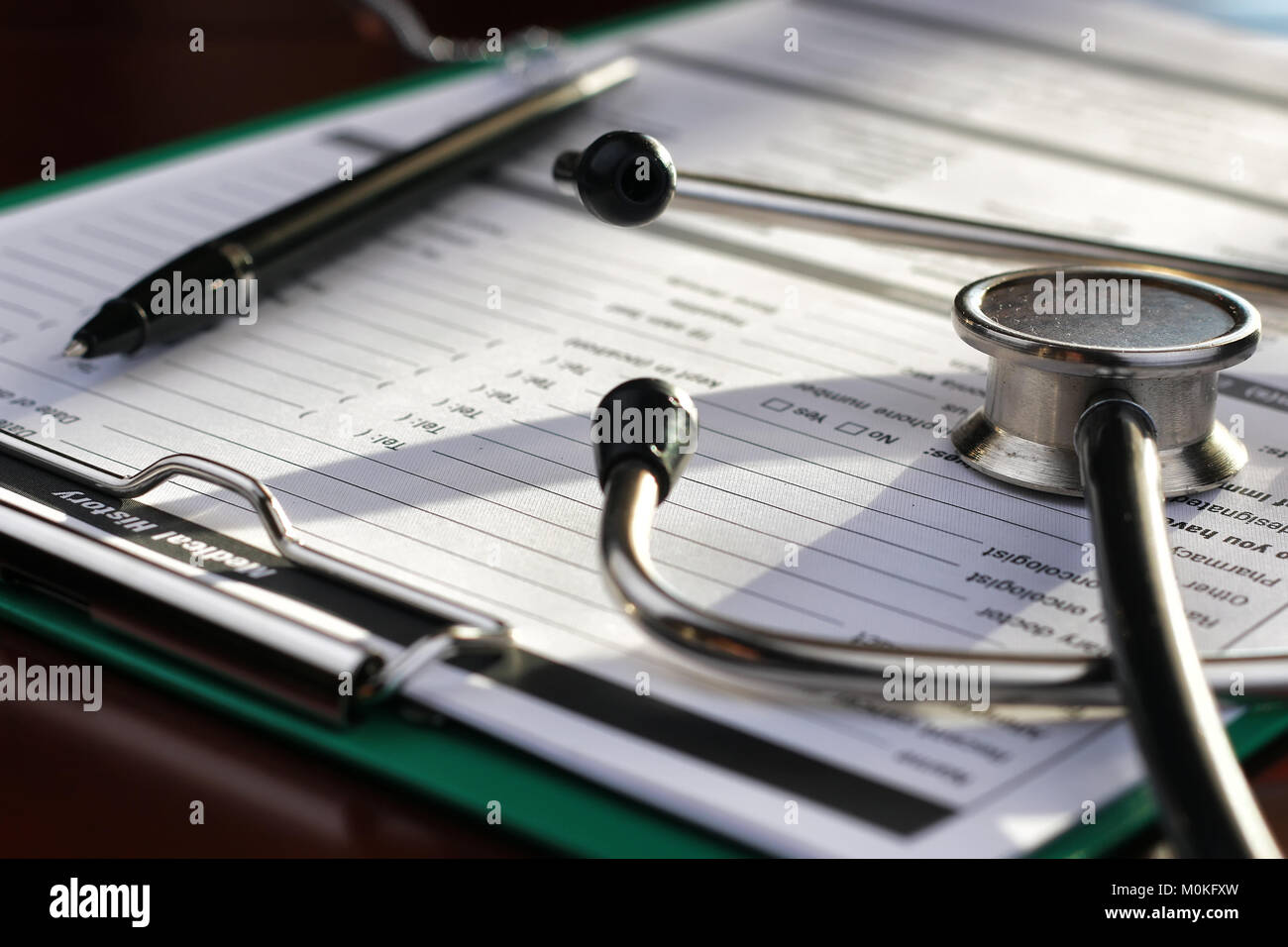 stethoscope medical documents pen Stock Photo - Alamy