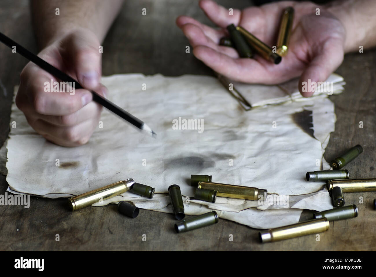 man write letter retro bullet on the table Stock Photo - Alamy