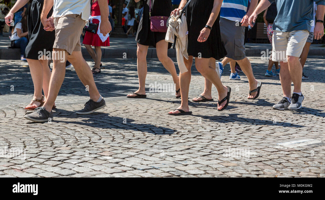 Detail image of the legs of unidentified people walking on the famous ...