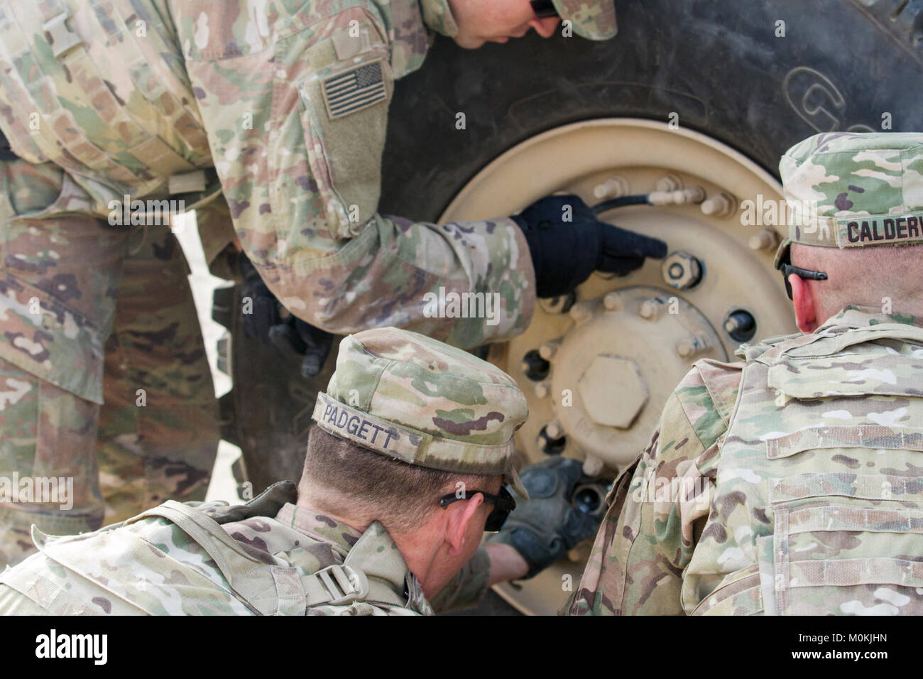 U.S. Army Spcs. John Rayeski and Joshua Padgett and Sgt. Dustin ...