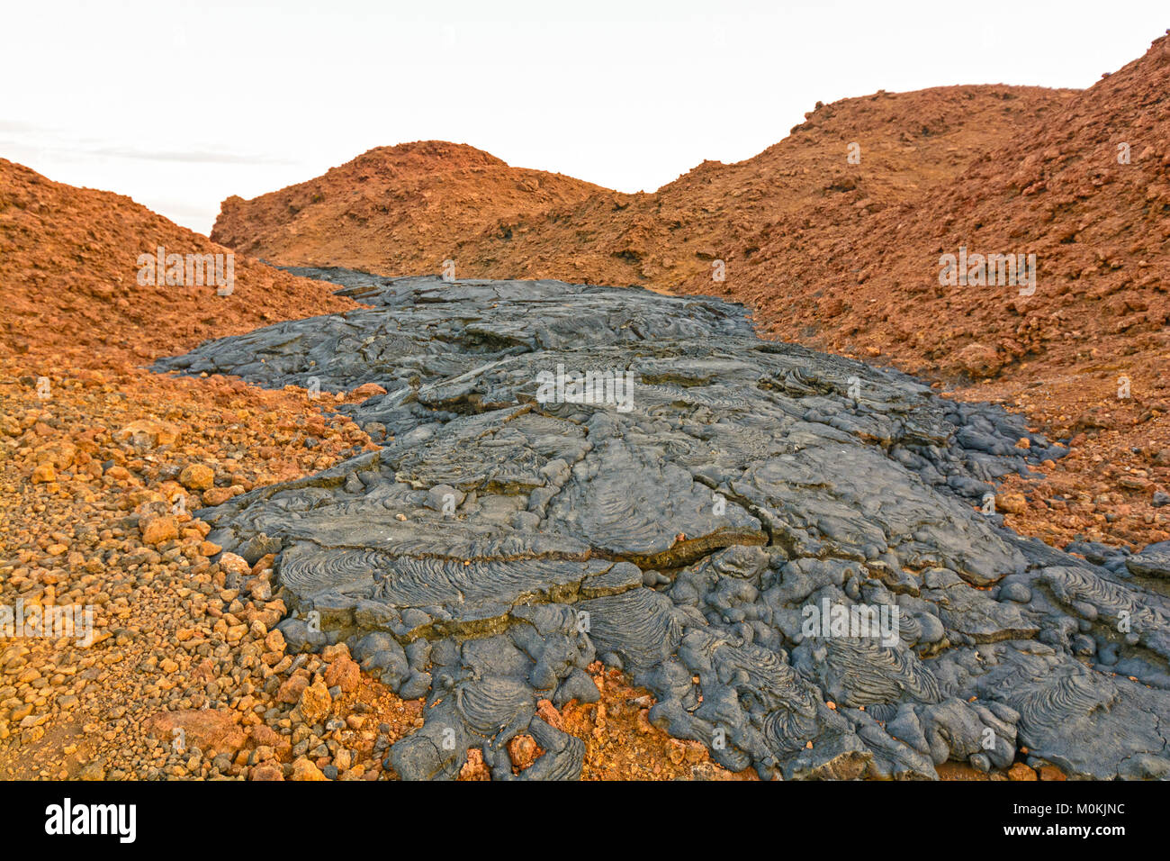 Black Lava Flow on Red Volcanic Ash on Santiago Island in the Galapagos ...