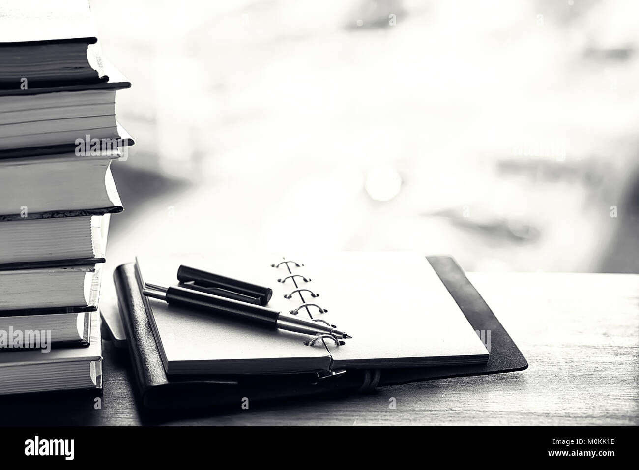A stack of textbooks on a table Stock Photo - Alamy