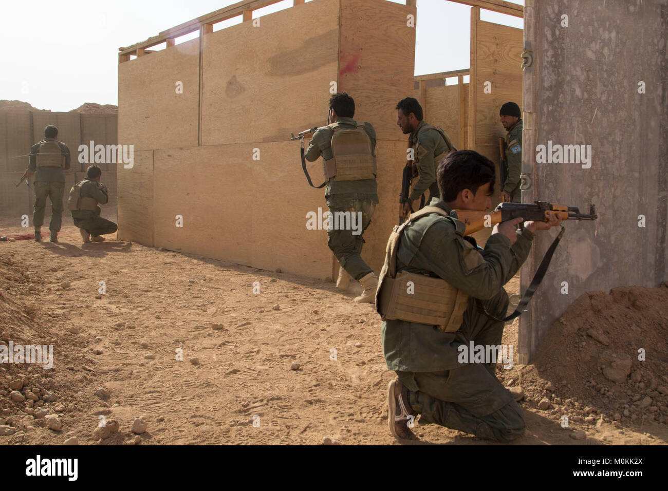 Raqqa Internal Security Force students clear a building during urban ...