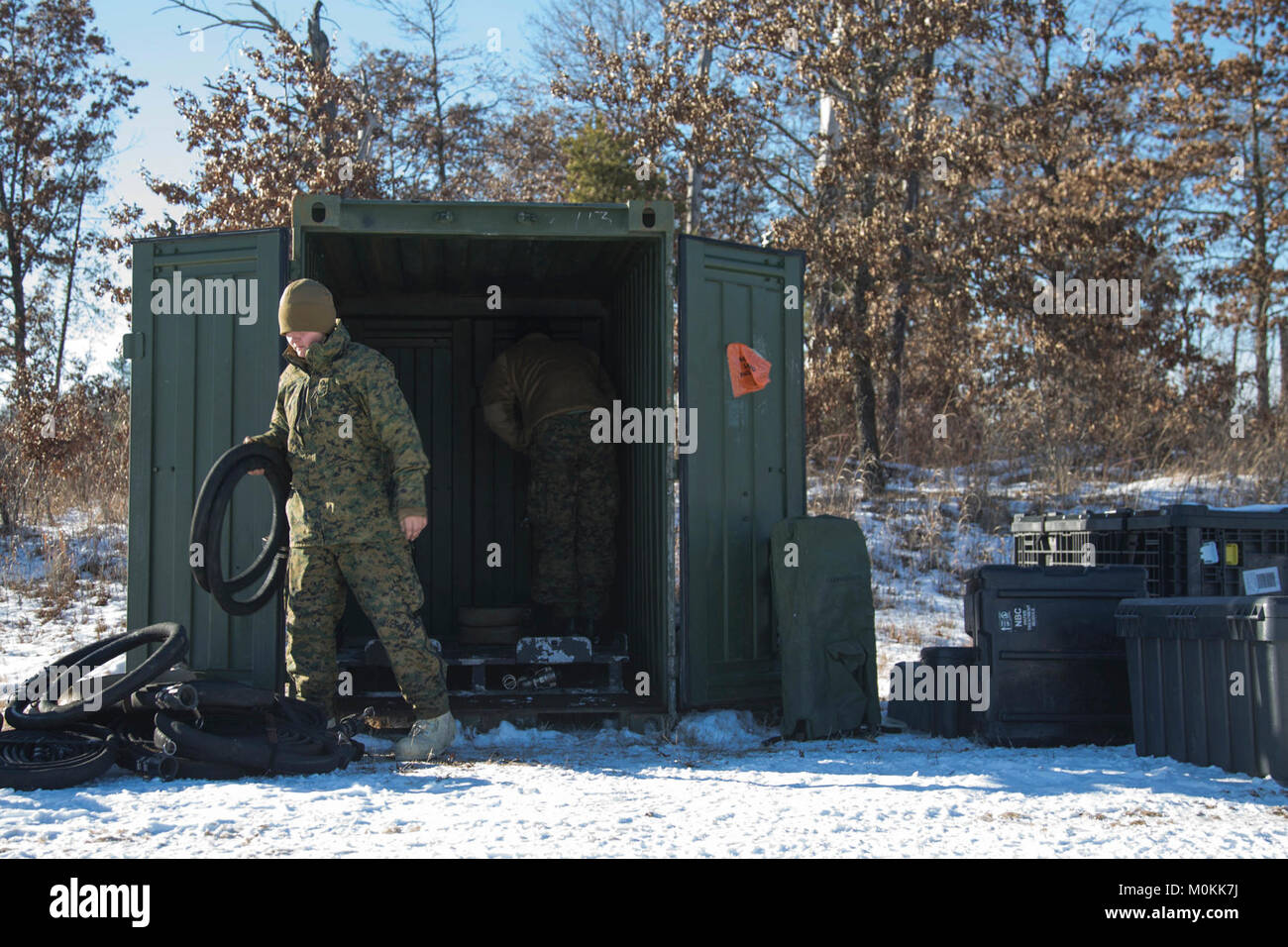 U.S. Marines with Marine Wing Support Squadron 271 disassemble a ...