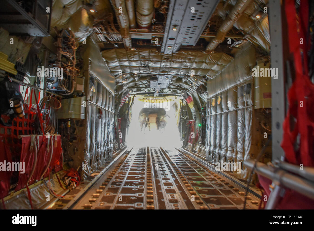 A 19,000 pound M777 Howitzer heavy drop floats just out the back of the ...