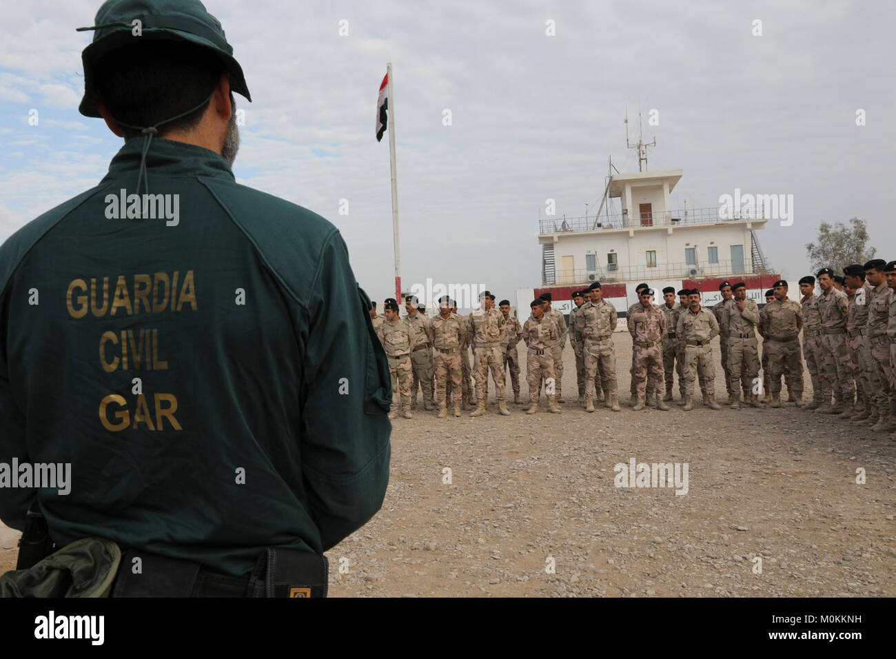 A Spanish Guardia Civil instructor stands before his Baghdad ...