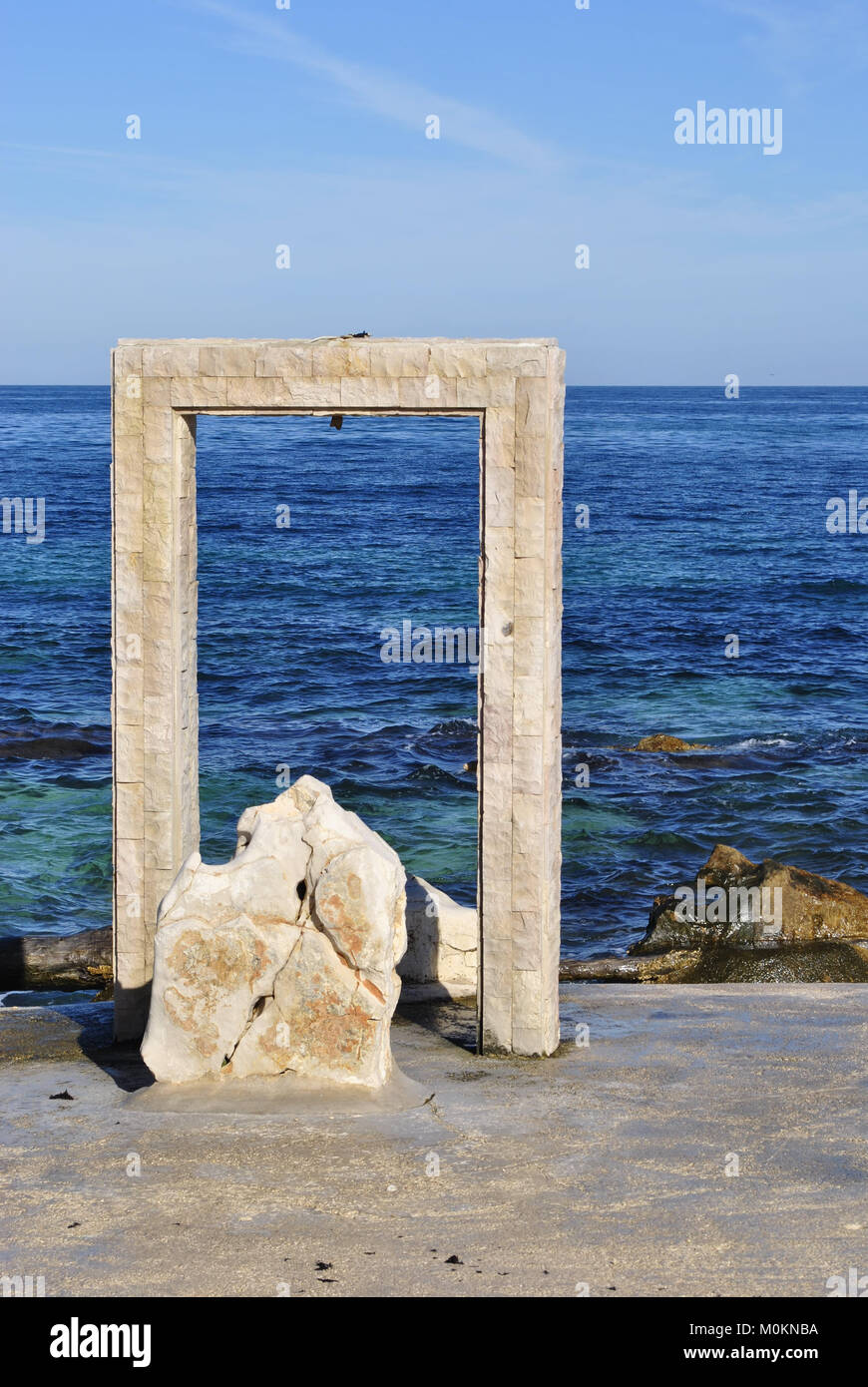 The shore of the Mediterranean Sea. Stone portal with sea view Stock ...
