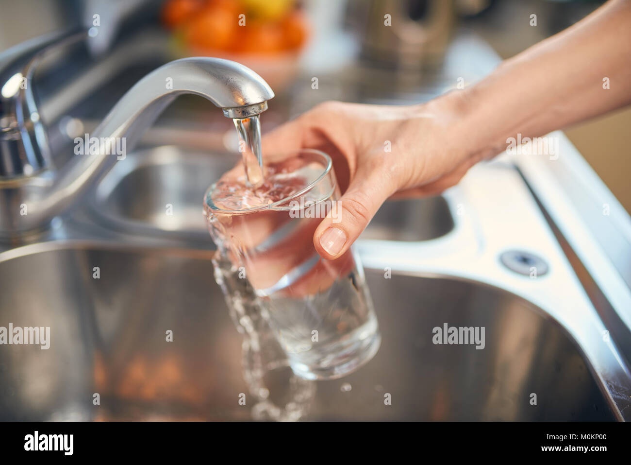Pouring Fresh Tap Water Into a Glass Stock Photo - Alamy