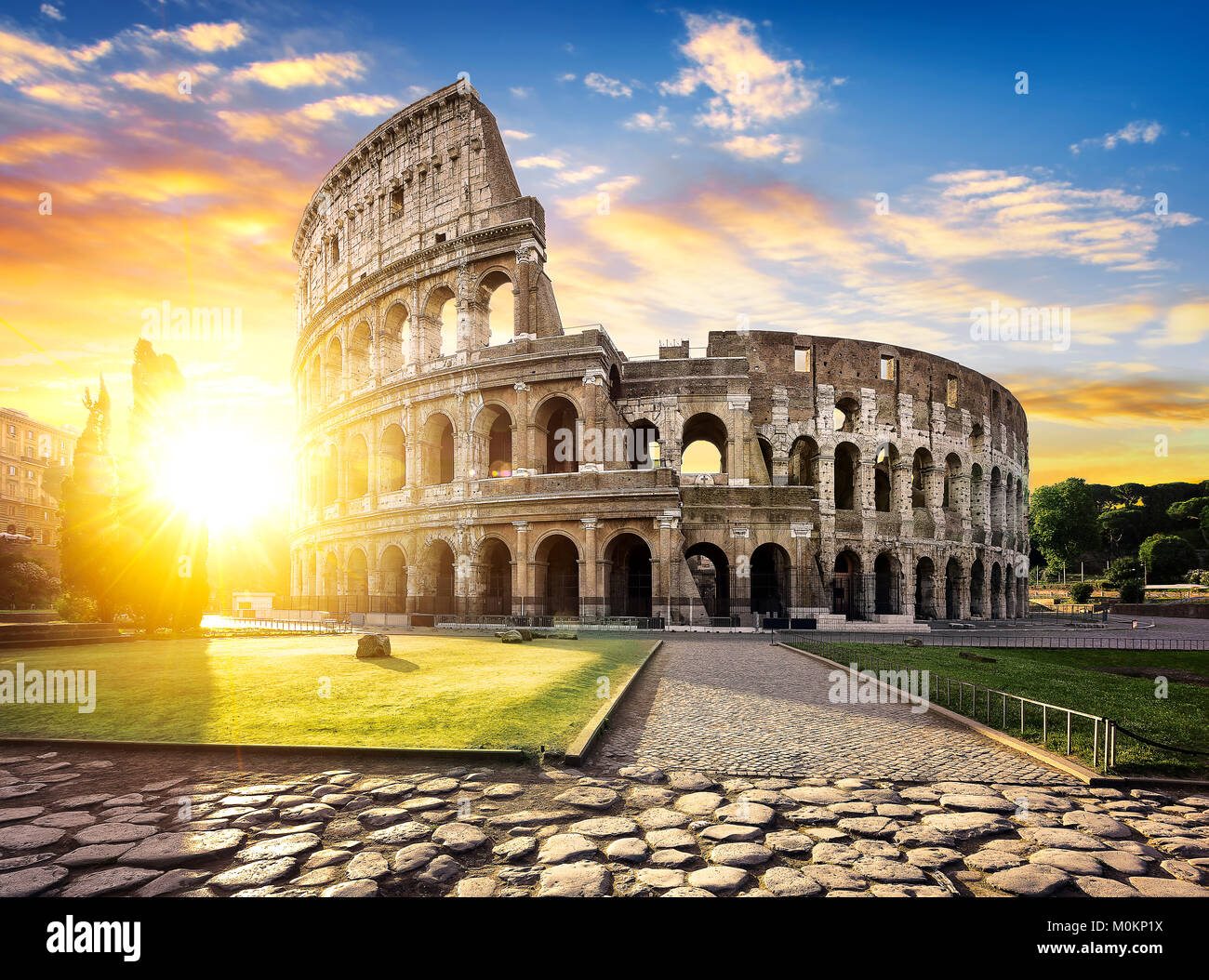 View of Colosseum in Rome and morning sun, Italy, Europe Stock Photo ...