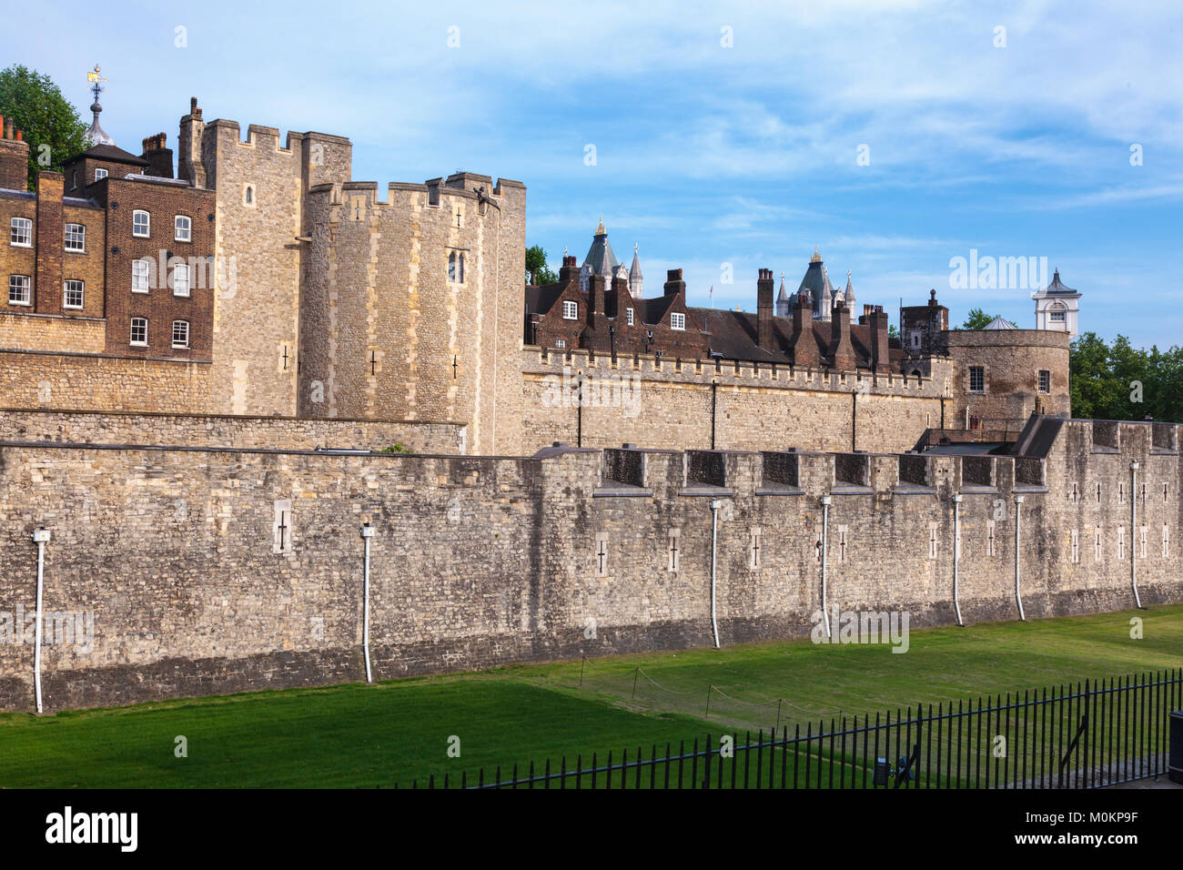 The outer curtain wall and dry moat of Tower of London - historic ...