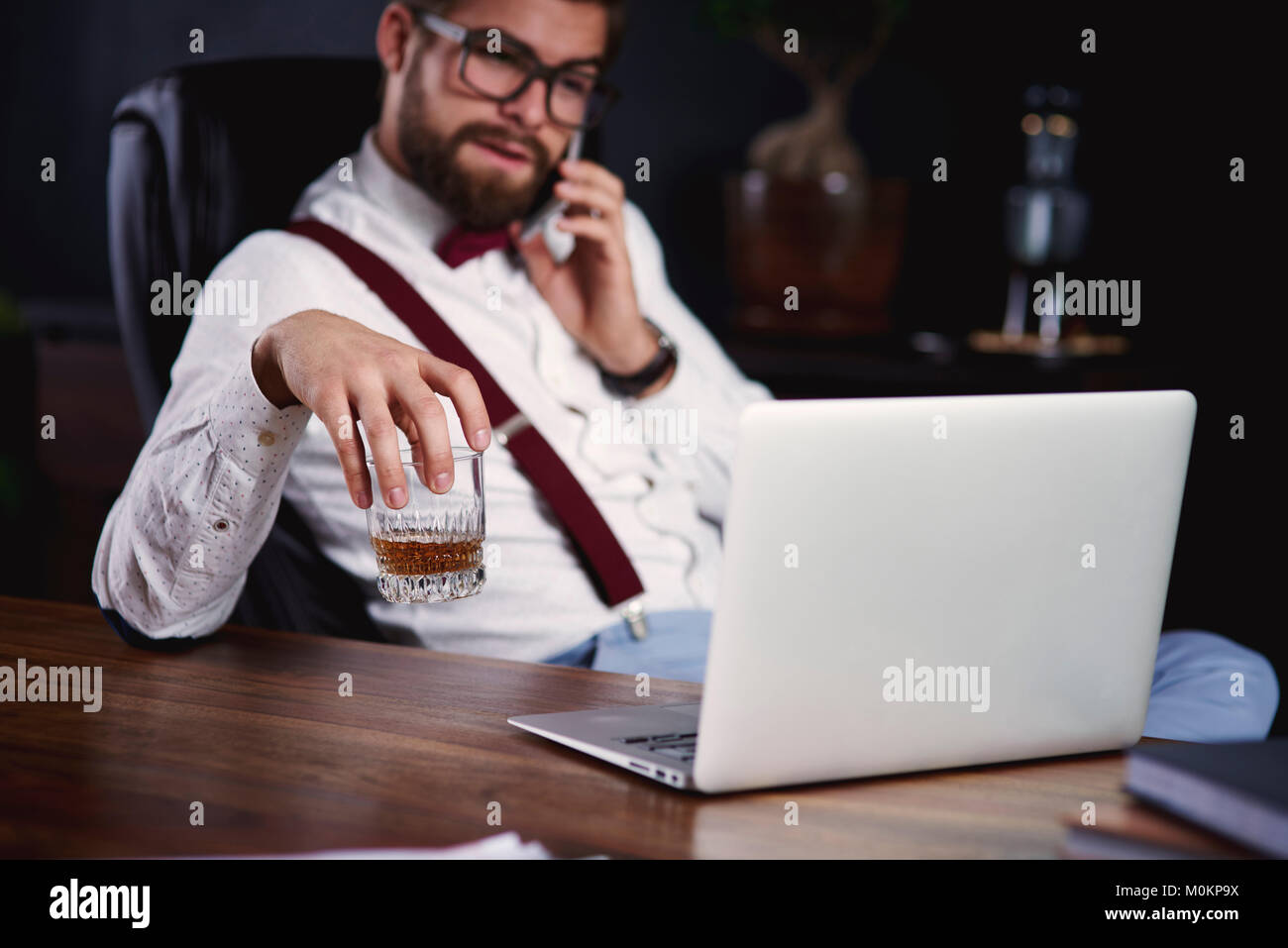 Modern leader working with technology Stock Photo - Alamy