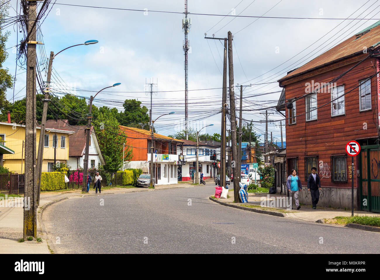 VALDIVIA, CHILE - OCTOBER 29, 2016: People walking on the sidewalk of ...