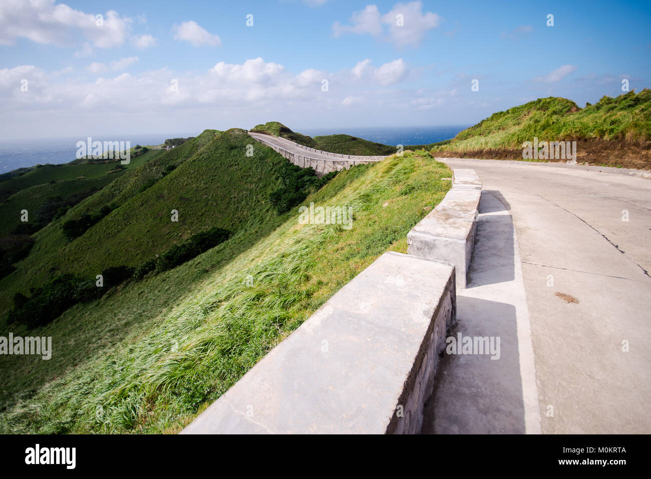 Scenic road at Vayang Rolling Hills, Batanes, Philippines Stock Photo ...