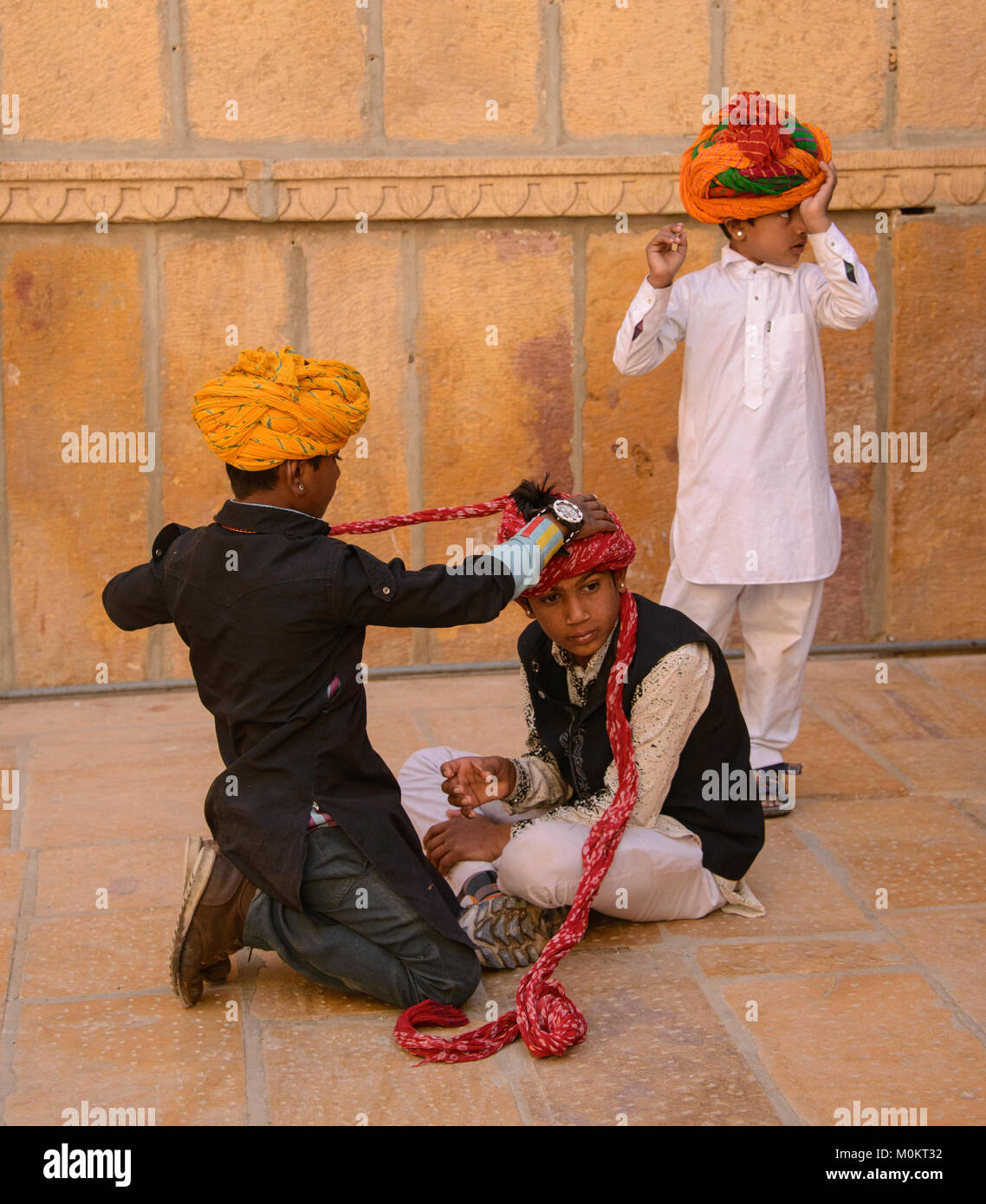 Boys putting on turbans, Jaisalmer, Rajasthan, India Stock Photo - Alamy