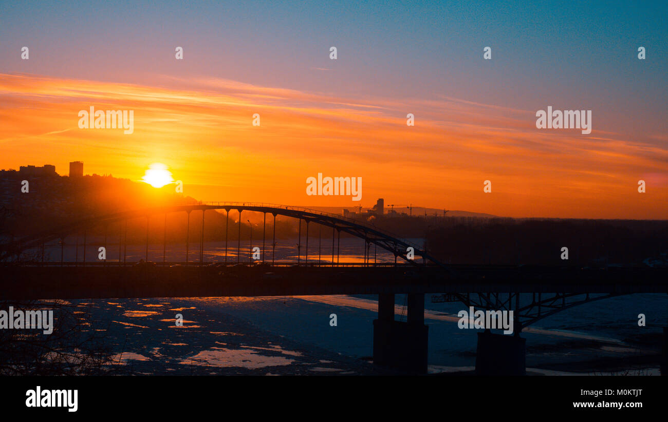 panorama of transport on the bridge and sunrise over the Belaya River ...