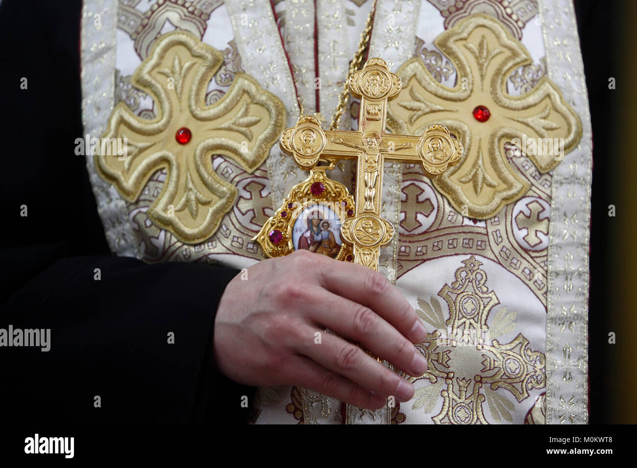 Bishop with a cross during the ceremony Stock Photo - Alamy