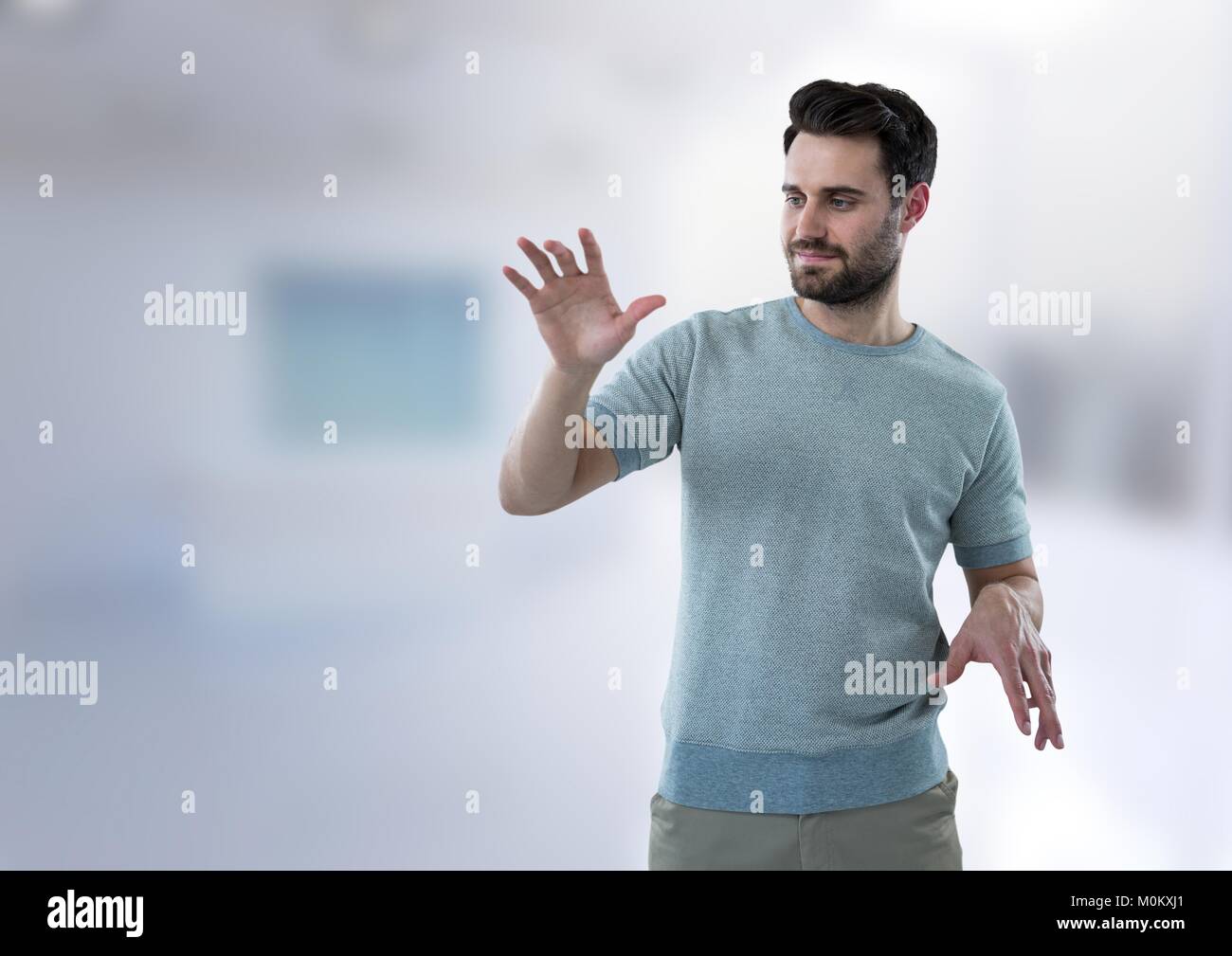 Man touching air Stock Photo - Alamy