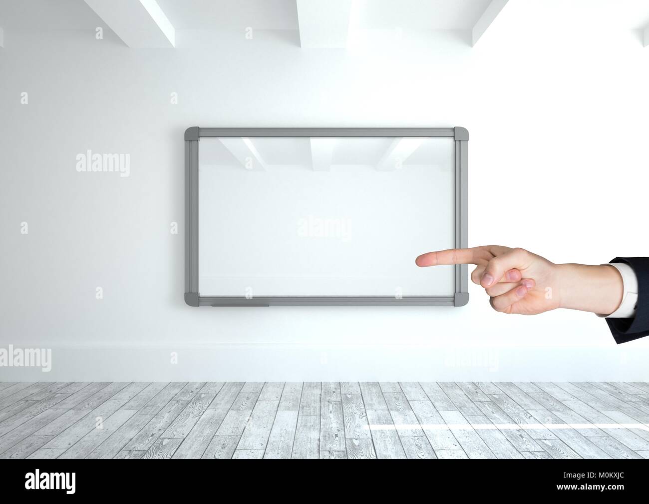 Hand pointing with wall board Stock Photo - Alamy