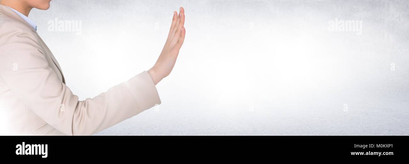 Hand stopping with bright background Stock Photo - Alamy