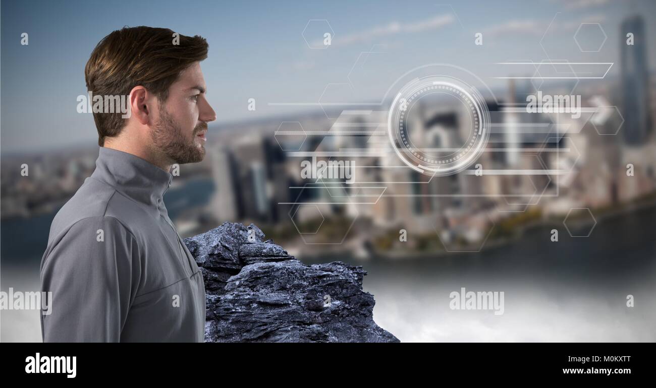 Man looking at interface over city background Stock Photo - Alamy