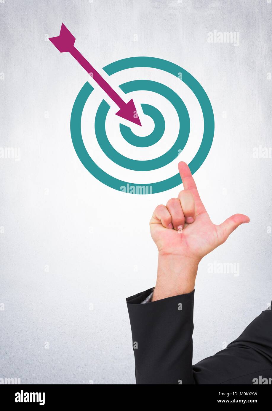 Hand pointing with business target and arrow icon Stock Photo - Alamy