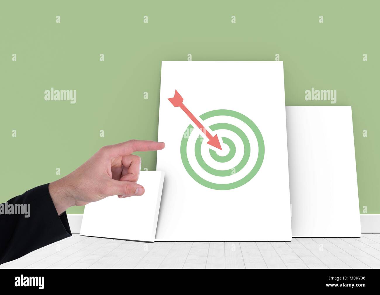 Hand pointing with business target and arrow icon Stock Photo - Alamy