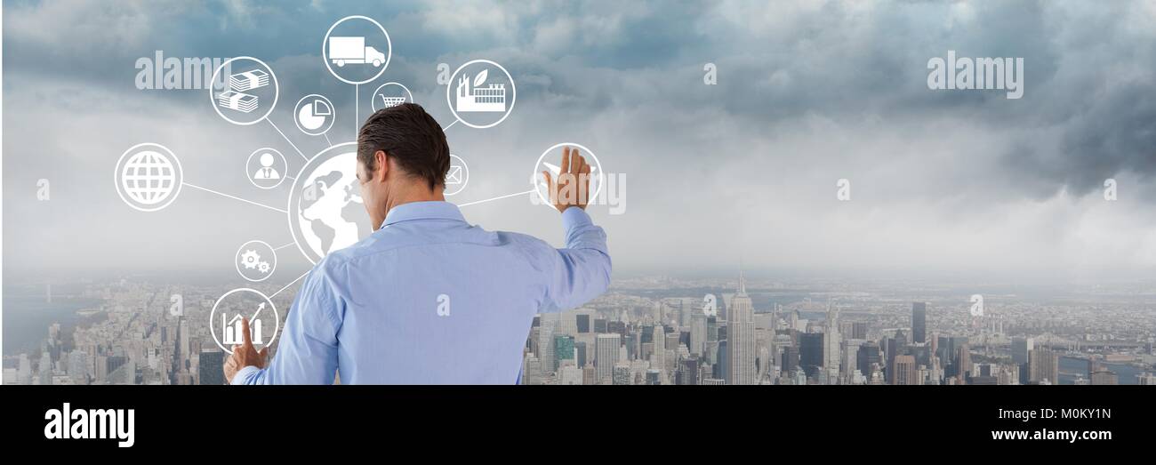 Man touching interface with city background Stock Photo - Alamy