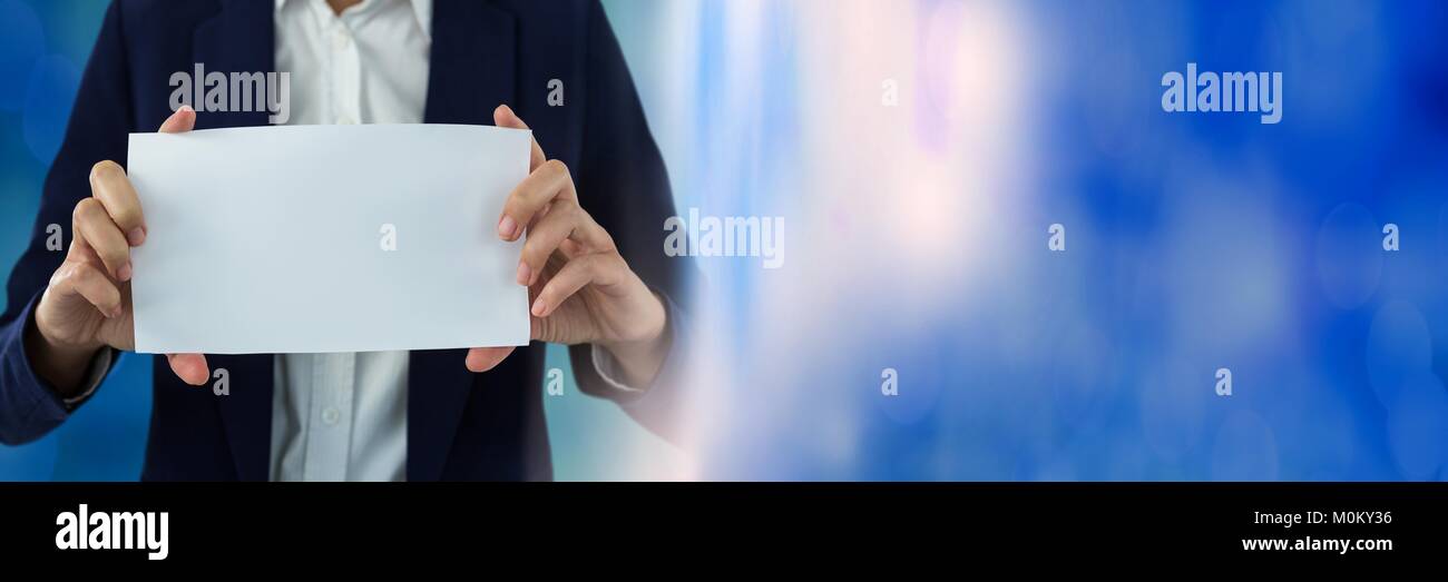 Business person holding blank card in hands Stock Photo - Alamy