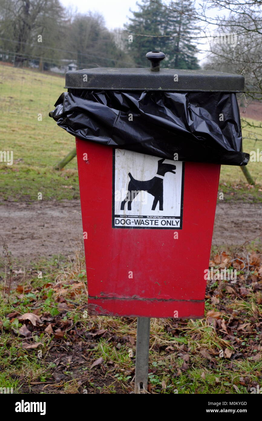 Dog poo bins in public area at a park in the UK Stock Photo - Alamy