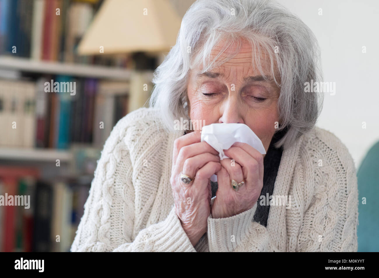 Sad sick senior woman hi-res stock photography and images - Alamy