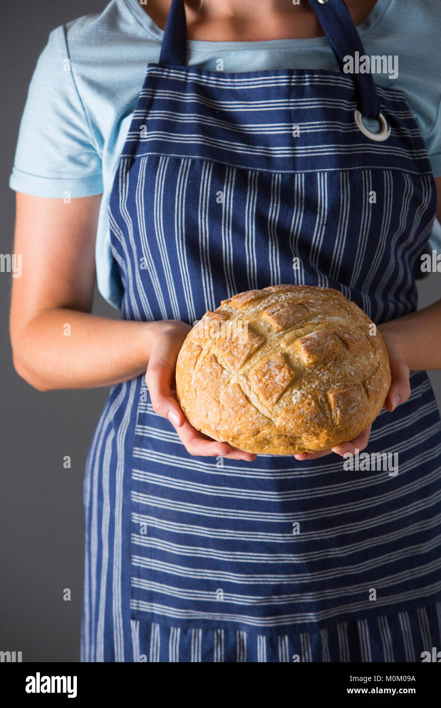 Baker wearing apron hi-res stock photography and images - Alamy