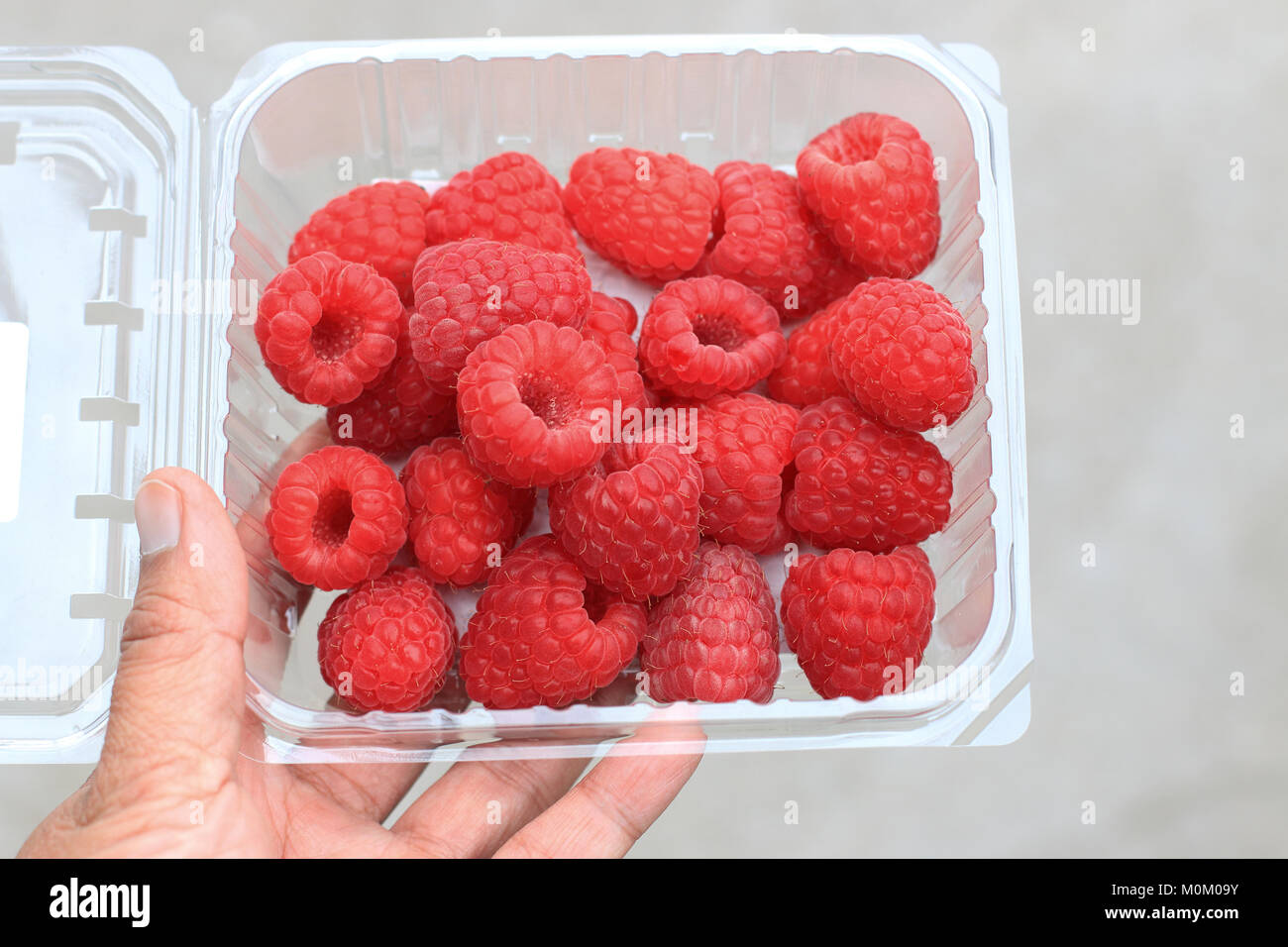 Hand holding snacks hi-res stock photography and images - Alamy