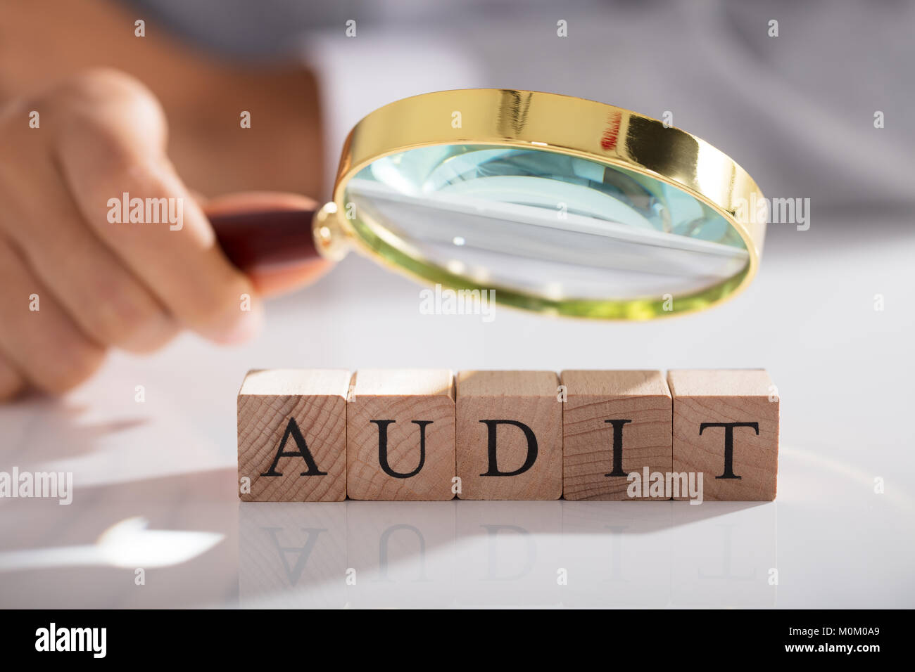 Audit word magnifying glass hi-res stock photography and images - Alamy