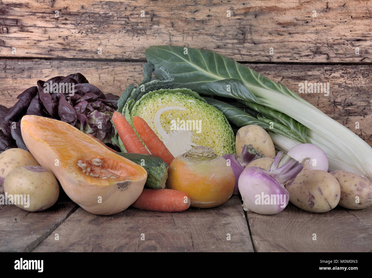 seasonal vegetables on a rustic plank Stock Photo - Alamy